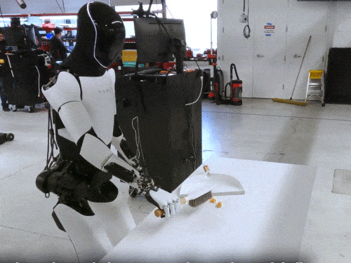 Tesla robot will now cook and clean too-Optimus seen doing daily chores ...