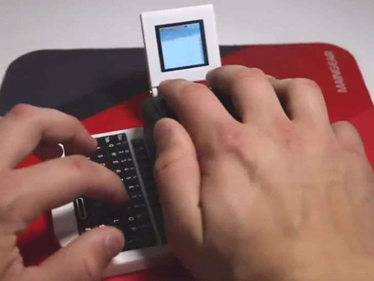 It looks like the world's smallest computer, screen and keyboard are ...