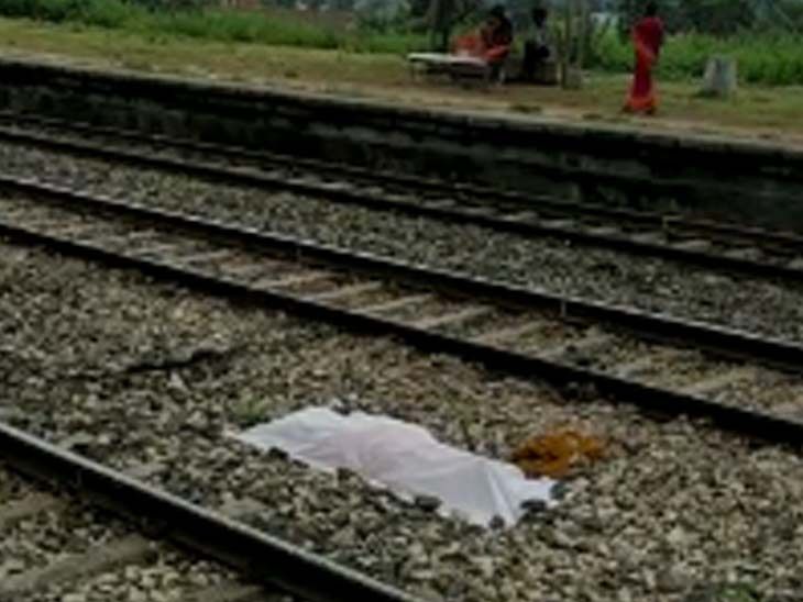 Seeing the goods train approaching Latehar station, the woman left the ...