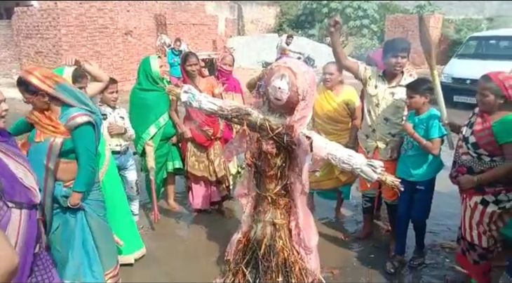 The symbolic effigy was lit, villagers cried beating their chest ...