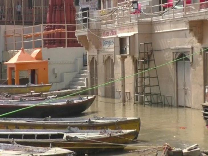 During the festive season in Varanasi, the rising water level of ...