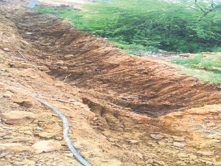 By digging the soil from the plot in Khadi Colony and putting it on the way