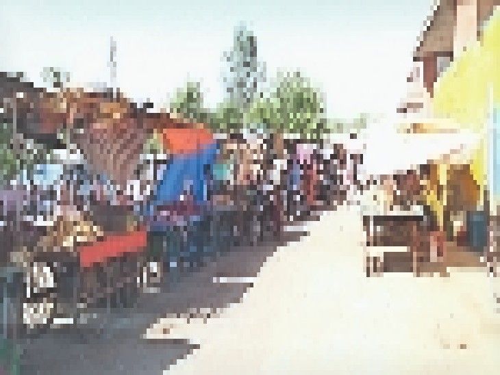 Standing in the bus stand premises, hand carts, no drinking water ...