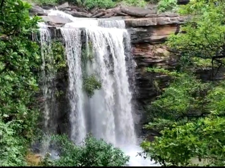 Attractive waterfall amidst greenery all around in Delawadi, attracting ...