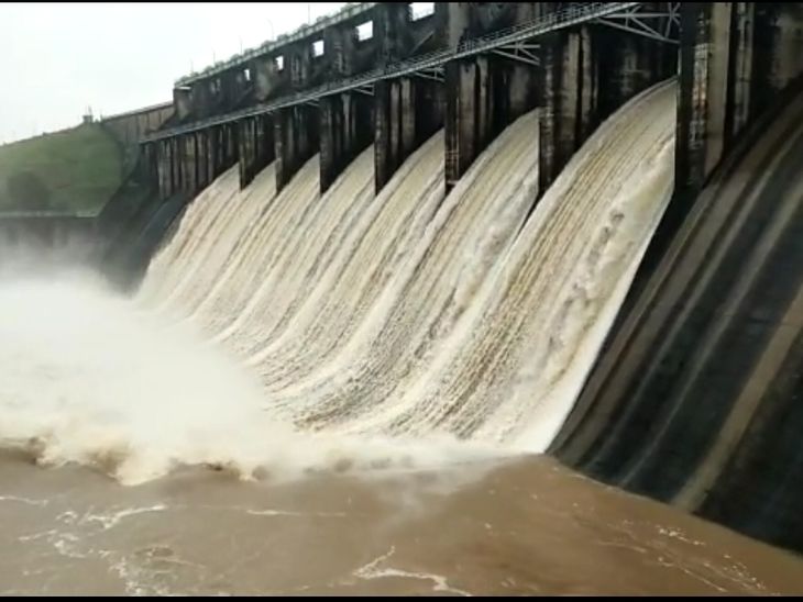 85344 cusec water being released into the Narmada river from the gate ...