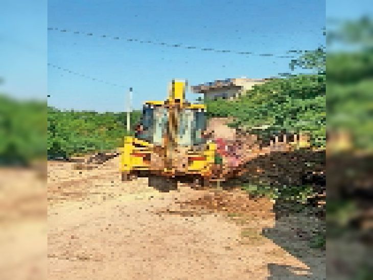 Revenue department officials removed the encroachment from the dark to ...