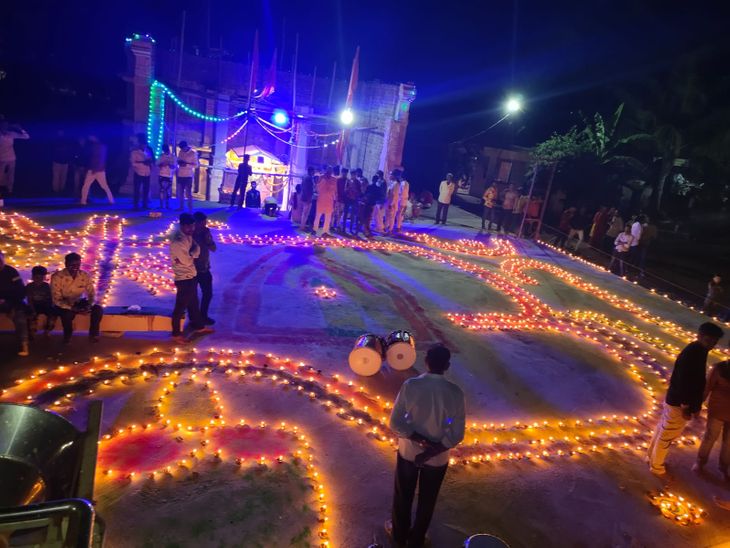 Mahadipavali in Mawata of Jawra, Om and Trishul decorated with lamps ...