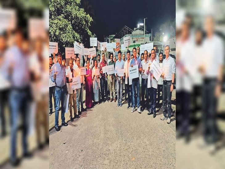 Candle march by doctors against linking biometric attendance with ...