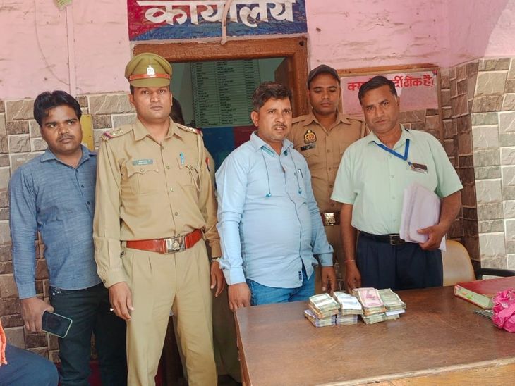 A team of police and static magistrate caught cash worth five lakhs ...