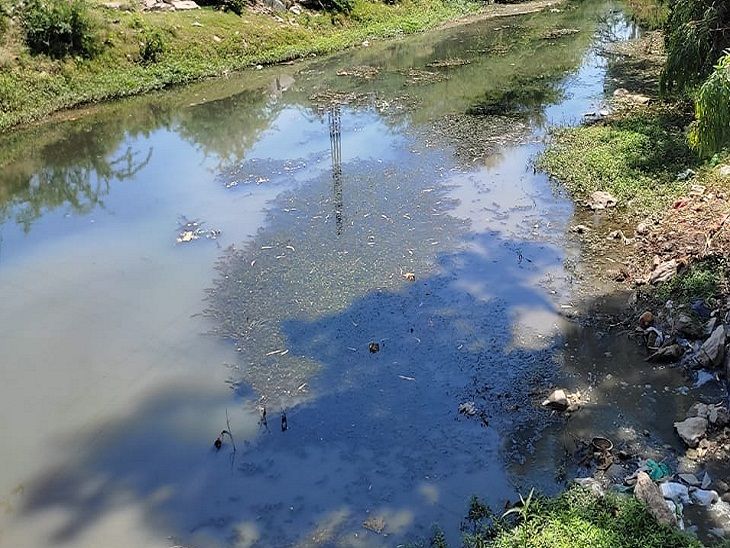 Akodara's clean water is flowing in a pile of dirt and debris on the ...