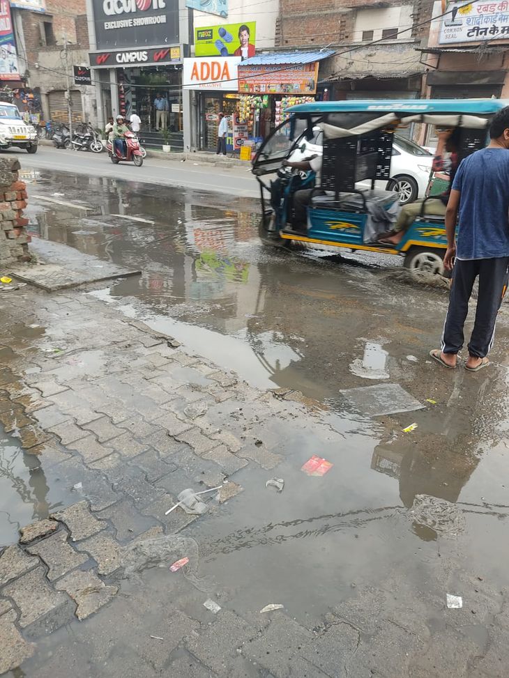 Dirty water filled with sewer jam on Assandh road, road built a year ...