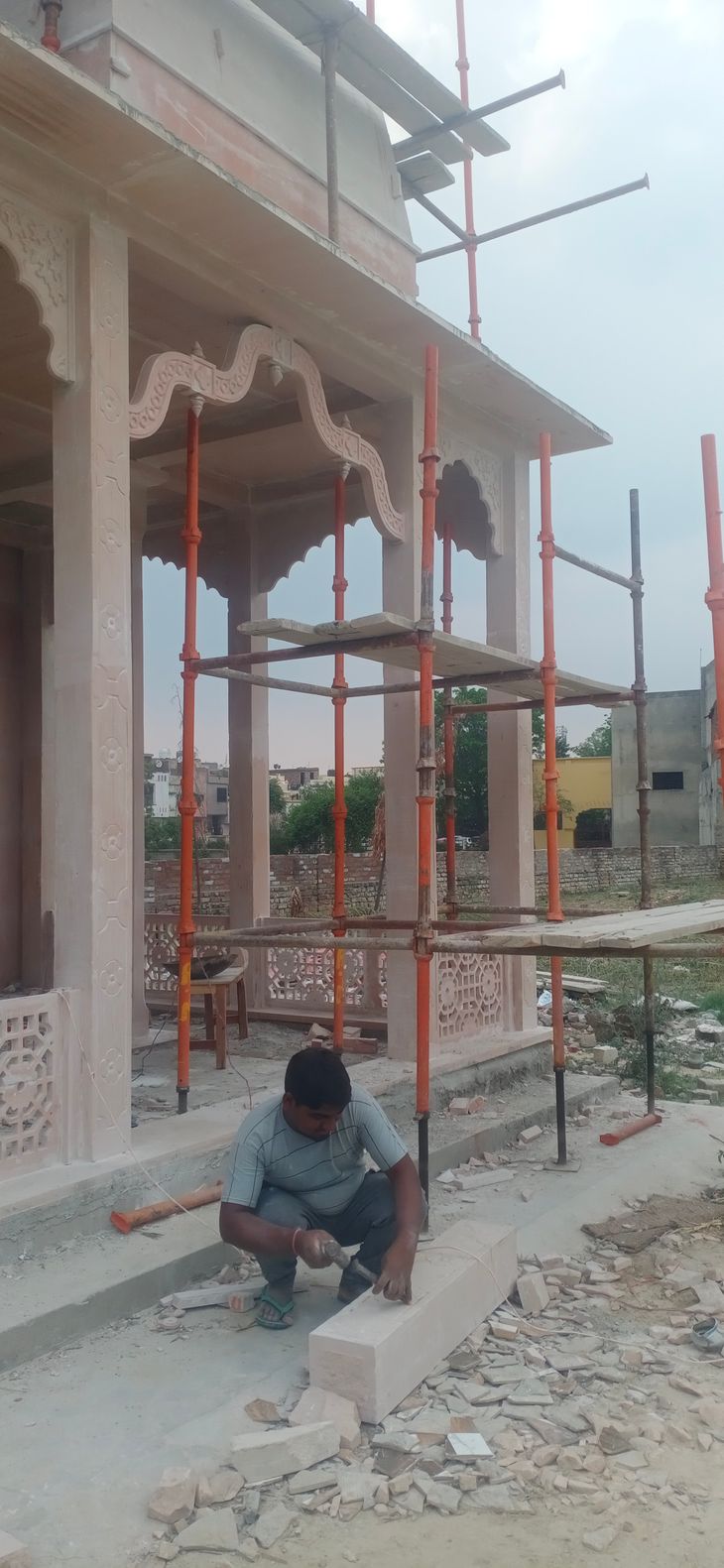 Brahma Kund Hanuman Babosa Temple being made of pink stone, beautiful ...