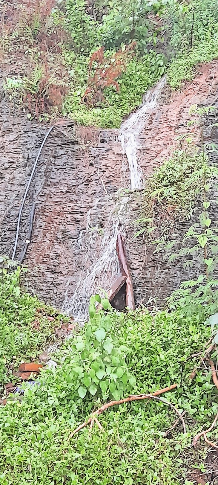 The water falling from the hill of Jatashankar temple took the form of ...