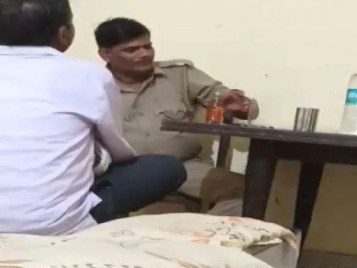 Policeman wearing uniform holding bottle, second video viral in two ...