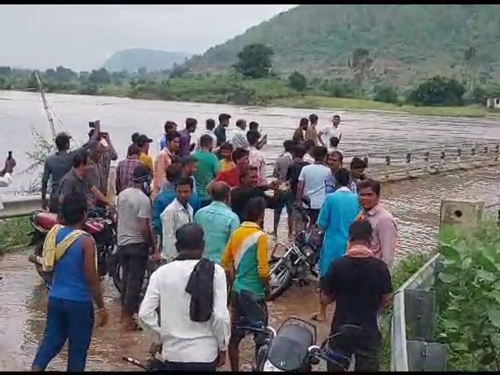 The bridge built on the Patne river in the district was submerged ...