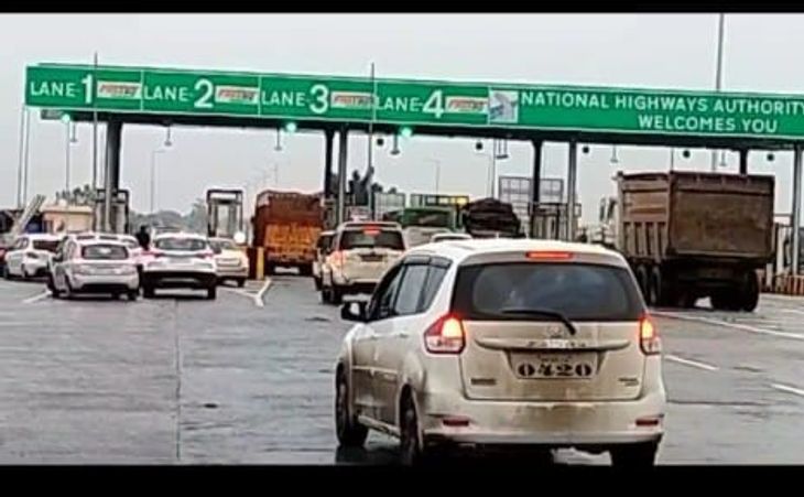 The bridge built near the toll and the vehicles coming towards Dewas ...