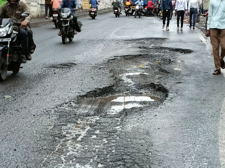 - Road stones are uprooted, deep potholes filled with water are being ...