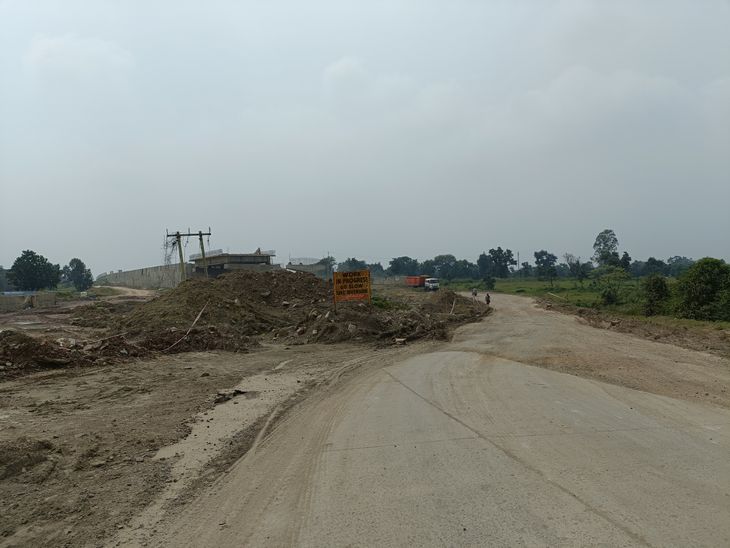 Land was not available in 5 years, hence four lane road will be built ...