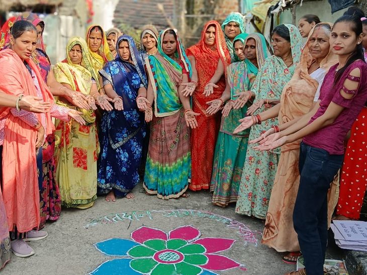 Appeal for 100% voting through rally, henna, rangoli and oath taking ...