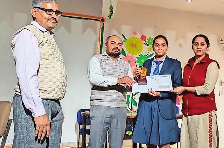 Riya stood first in English speech competition and Himanshi stood first ...