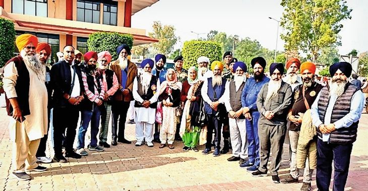 A group of Sikh devotees returned home after celebrating Prakash Parv ...