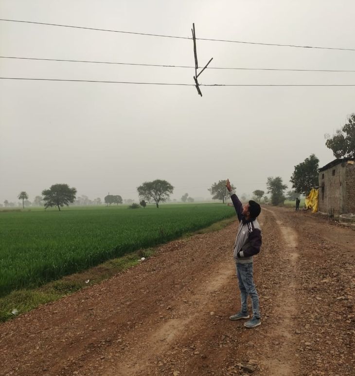 Manakhedi Road...Construction stopped due to swinging 11 KV wire ...