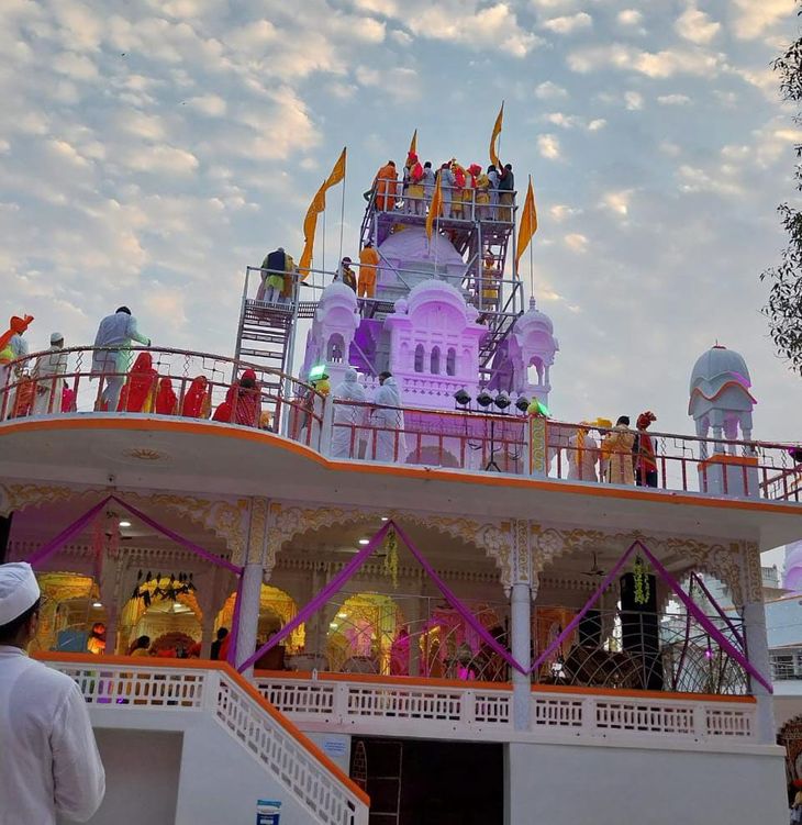 A procession was taken out and the urn was offered on the top of the ...