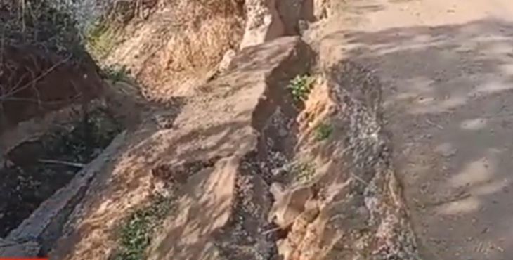 Approach wall of broken road in front of school in Ajnas Khurd | अजनास ...