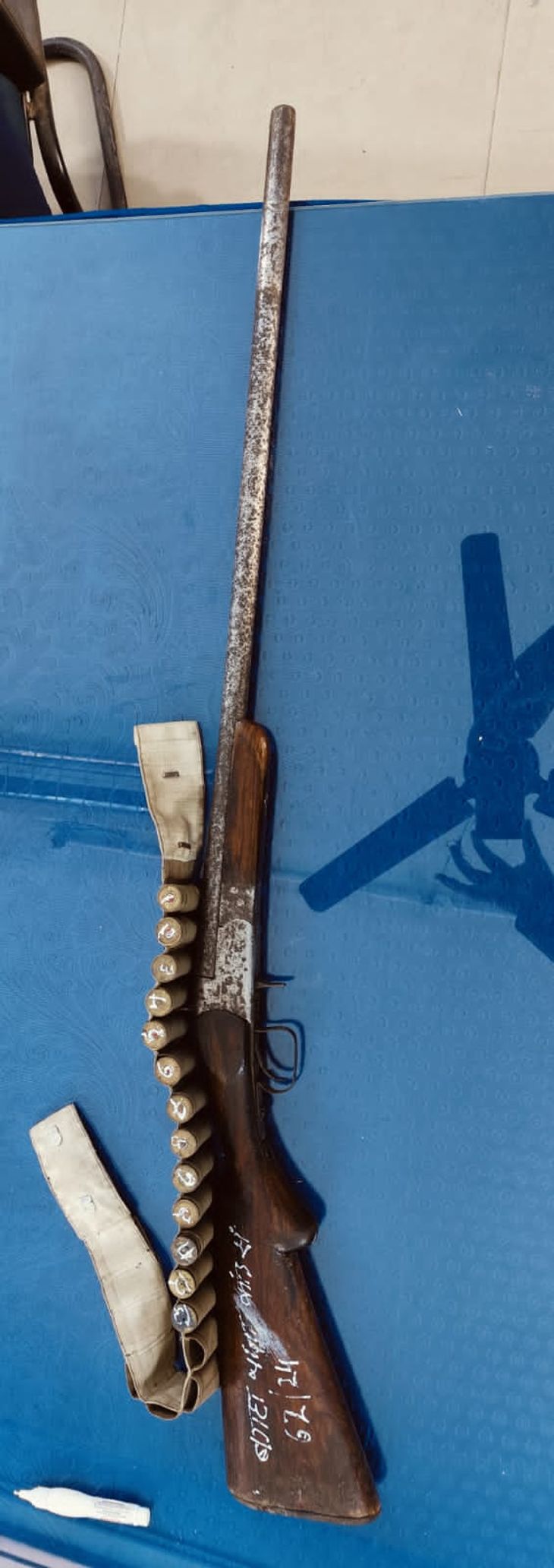 A gun and 10 cartridges were recovered from the poor house. | पुअर हाउस ...