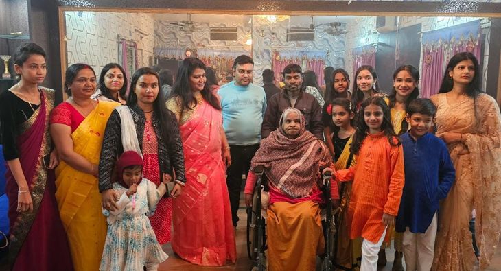 Wheel chair handed over to disabled old lady on her wedding anniversary ...
