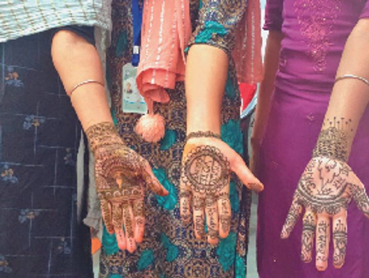 Priya became the winner in mehndi competition under voter awareness ...