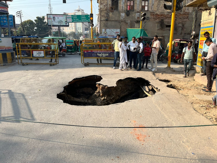 Road caved in on Sigra-Rathayatra route...scooty driver narrowly ...