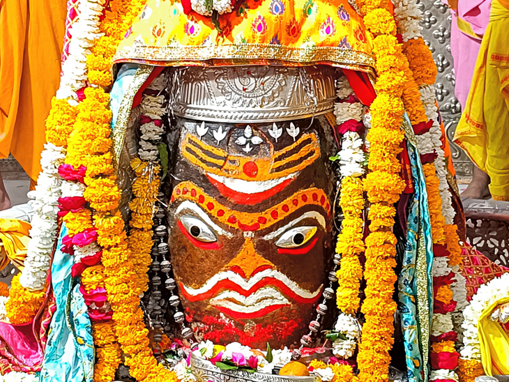 Shringar by offering sandalwood tripund with silver bill leaf on the ...