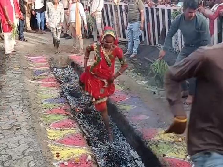 Hundreds of devotees showed their faith by walking on embers, event ...