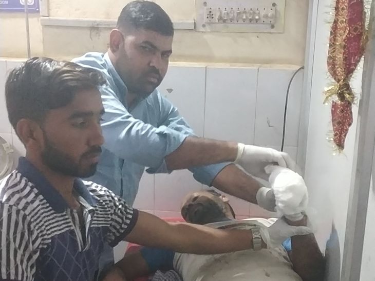 The worker's hand got cut off after it got stuck in the thresher ...