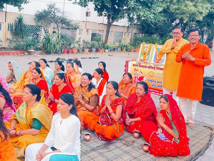 Welcoming the new year by collectively offering water to the first ray ...