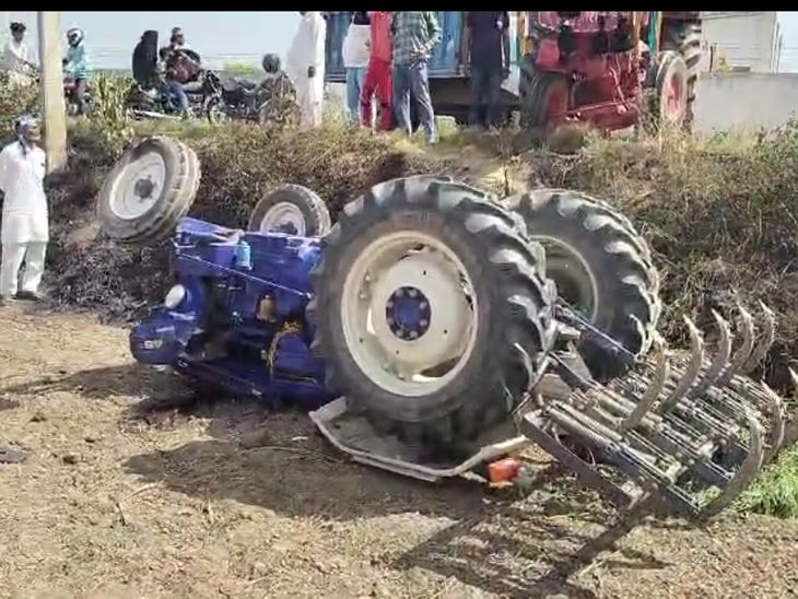A tractor-trolley loaded with bricks collided with another tractor