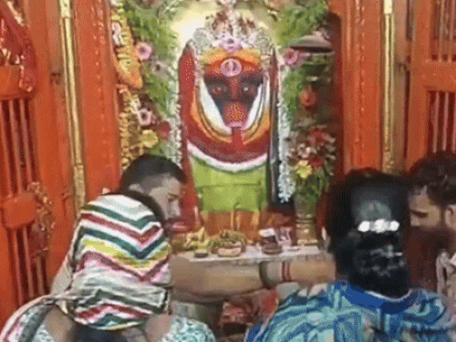 A crowd of devotees gathered to visit the ancient Kalaratri temple ...