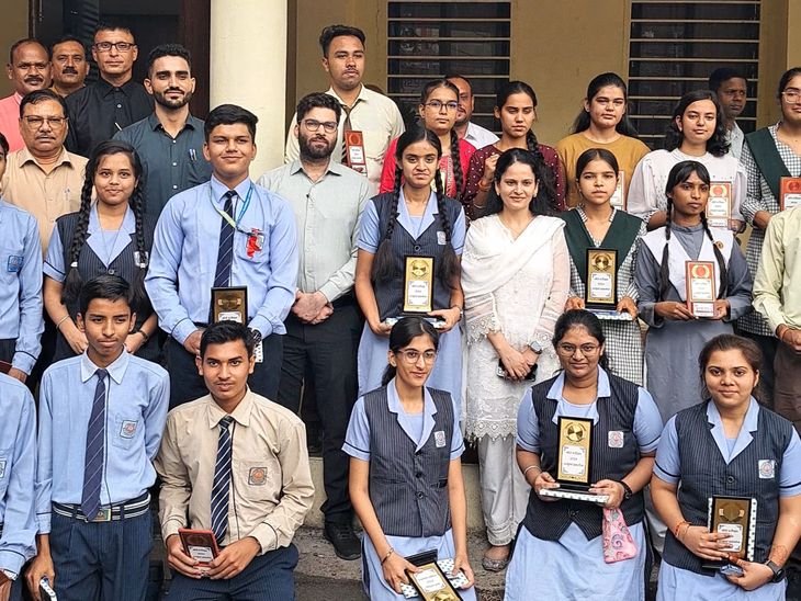 The collector honored the students included in the merit list of the ...