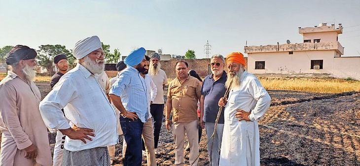 Sparks came out from the transformer installed in the field of village ...
