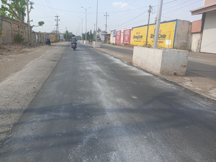 Asphalt layer laid on the road in the section passing through the city ...