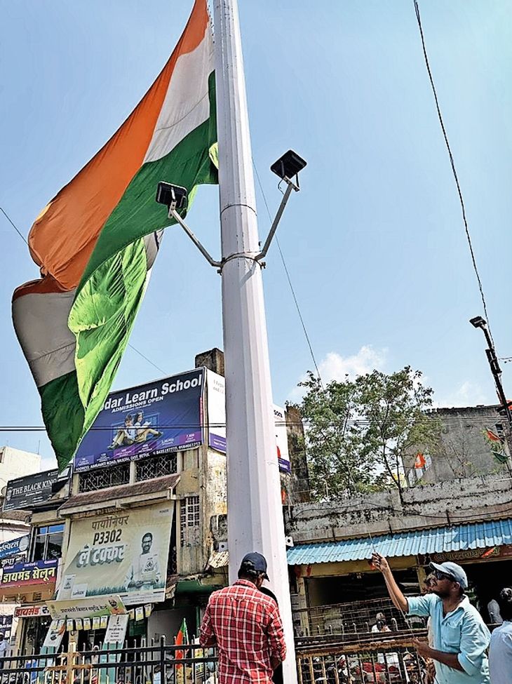 The flag installed at a height of 101 feet was replaced after it got ...