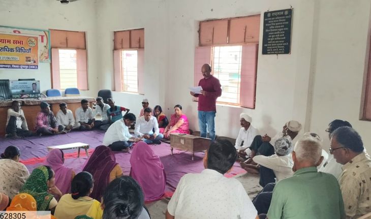 Information about new laws was given in the village assembly of Bhiluda ...