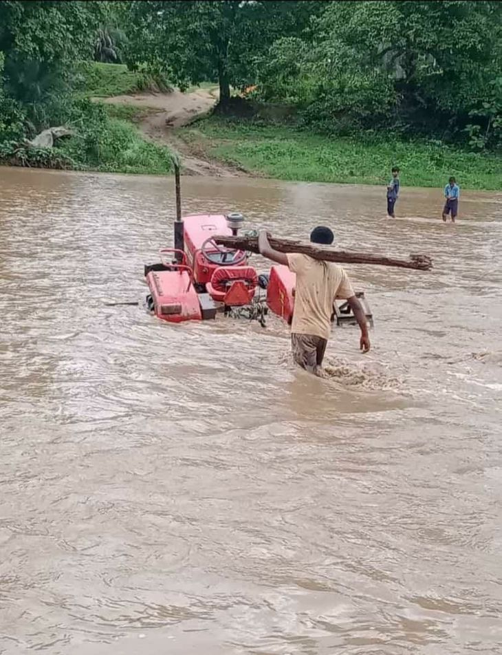 Demand for bridge since last three years... Tractor stuck in flood of ...