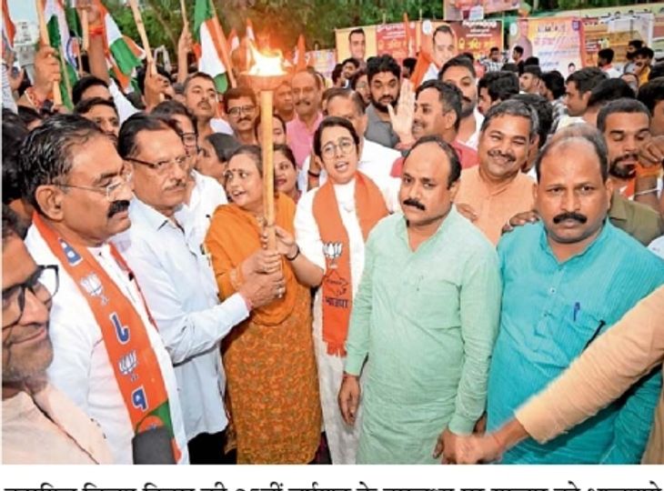 BJP took out a torchlight procession on the eve of Kargil Vijay Diwas ...