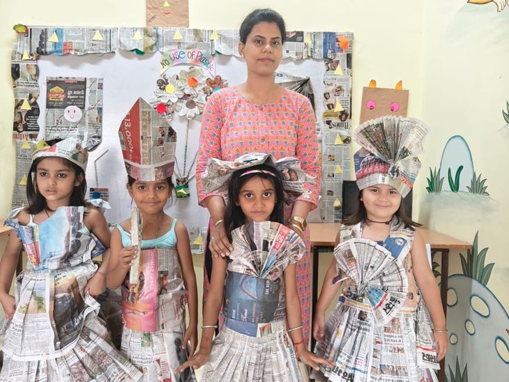 A ramp walk of clothes made from paper and newspaper was organised ...