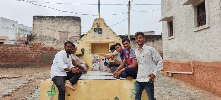 Worship of the snake god by offering milk on the festival of Nag ...
