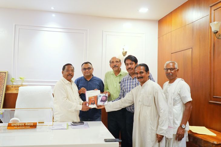 Art of Living members met Minister Ramvichar Netam