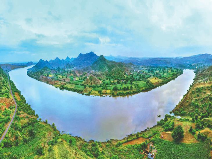 Mountains on one side, dam's backwater on the other, 1000 villagers ...