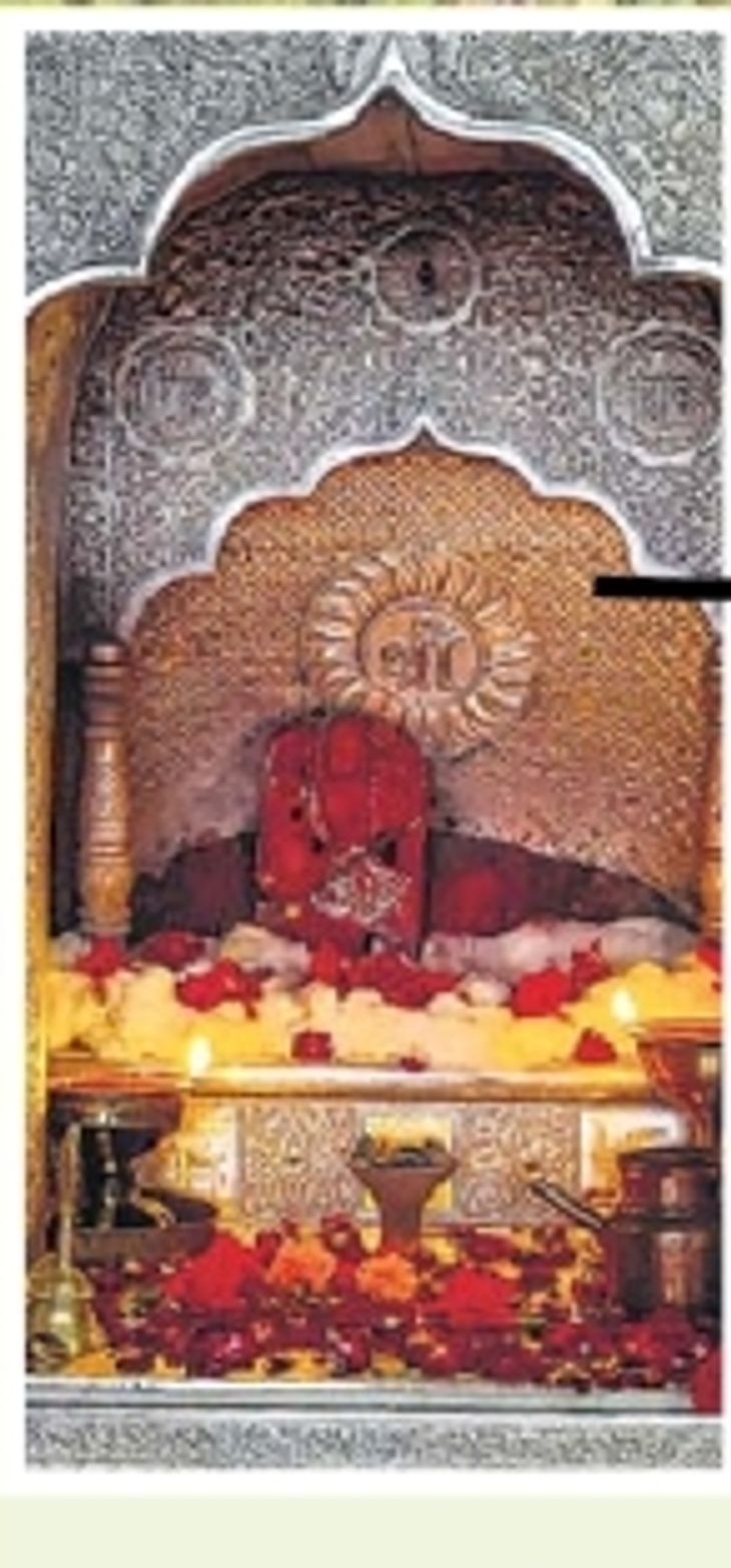 Banki Mata temple is being built on the mountain with pink stones ...